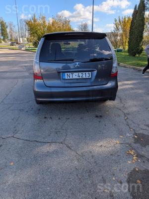 Blue Mitsubishi Grandis 2007 in Riga, with an engine capacity of 2.00 L and mileage of 217 thousand km for 2200 €, photo 4 on AUTOMOTO.COM.LV