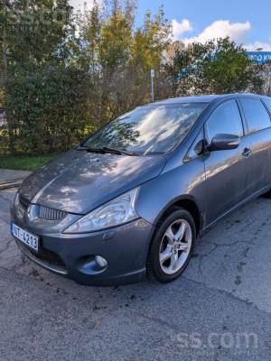 Blue Mitsubishi Grandis 2007 in Riga, with an engine capacity of 2.00 L and mileage of 217 thousand km for 2200 €, photo 6 on AUTOMOTO.COM.LV