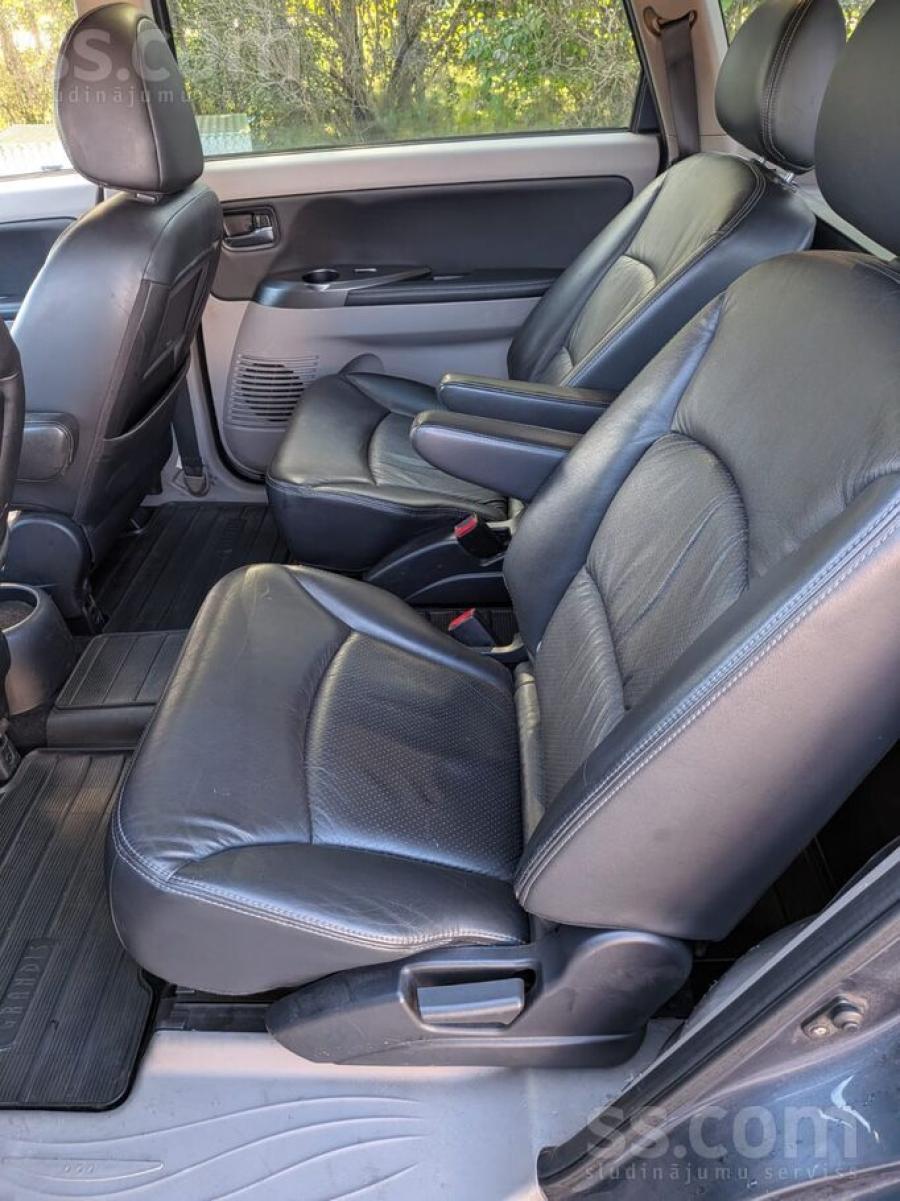 Blue Mitsubishi Grandis 2007 in Riga, with an engine capacity of 2.00 L and mileage of 217 thousand km for 2200 €, photo 7 on AUTOMOTO.COM.LV
