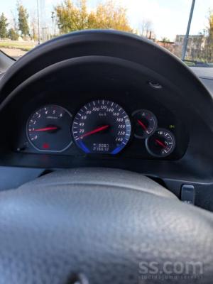 Blue Mitsubishi Grandis 2007 in Riga, with an engine capacity of 2.00 L and mileage of 217 thousand km for 2200 €, photo 17 on AUTOMOTO.COM.LV