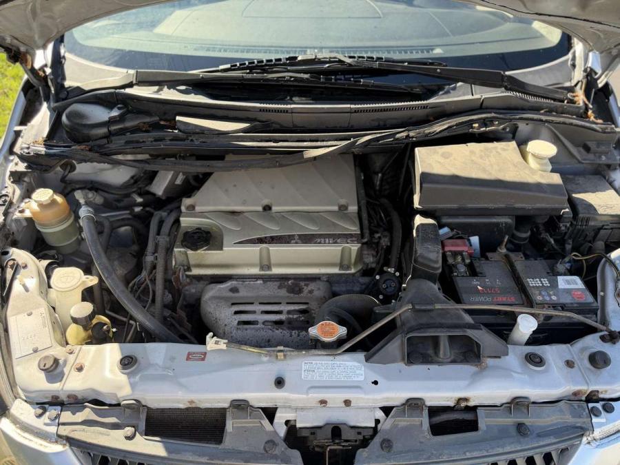 Pelēks Mitsubishi Grandis 2005 Kauņa, ar dzinēja tilpumu 2.38 L un nobraukumu 298 tūkst. km par 1950 €, foto 33 vietnē AUTOMOTO.COM.LV