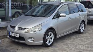 Pelēks Mitsubishi Grandis 2008 Rīga, ar dzinēja tilpumu 2.40 L un nobraukumu 158 tūkst. km par 6500 €, foto  vietnē AUTOMOTO.COM.LV