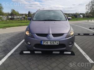 Violets Mitsubishi Grandis 2005 Rīga, ar dzinēja tilpumu 2.40 L un nobraukumu 236 tūkst. km par 1300 €, foto  vietnē AUTOMOTO.COM.LV