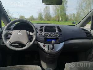 Violet Mitsubishi Grandis 2005 in Riga, with an engine capacity of 2.40 L and mileage of 236 thousand km for 1300 €, photo 8 on AUTOMOTO.COM.LV
