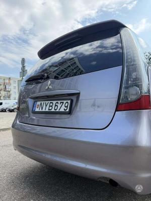Violet Mitsubishi Grandis 2006 in Vilnius, with an engine capacity of 2.38 L and mileage of 307 thousand km for 2900 €, photo 14 on AUTOMOTO.COM.LV