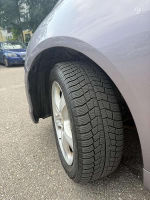 Violet Mitsubishi Grandis 2006 in Vilnius, with an engine capacity of 2.38 L and mileage of 307 thousand km for 2900 €, photo 23 on AUTOMOTO.COM.LV