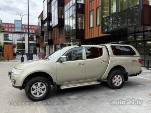 Beige Mitsubishi l-200 2010 in Tallinn, with an engine capacity of 2.50 L and mileage of 161 thousand km for 9990 €, photo 6 on AUTOMOTO.COM.LV