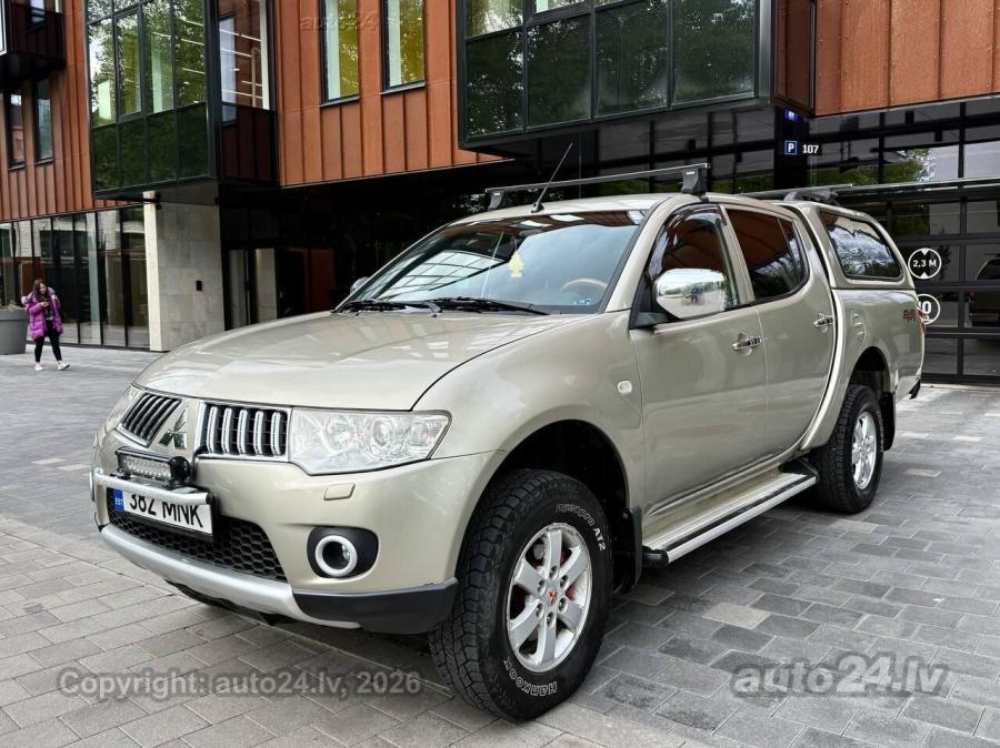 Beige Mitsubishi l-200 2010 in Tallinn, with an engine capacity of 2.50 L and mileage of 161 thousand km for 9990 €, photo 13 on AUTOMOTO.COM.LV