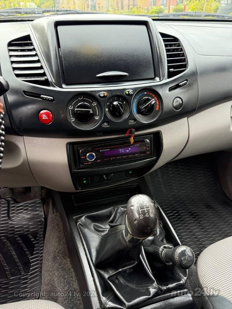 Beige Mitsubishi l-200 2010 in Tallinn, with an engine capacity of 2.50 L and mileage of 161 thousand km for 9990 €, photo 26 on AUTOMOTO.COM.LV