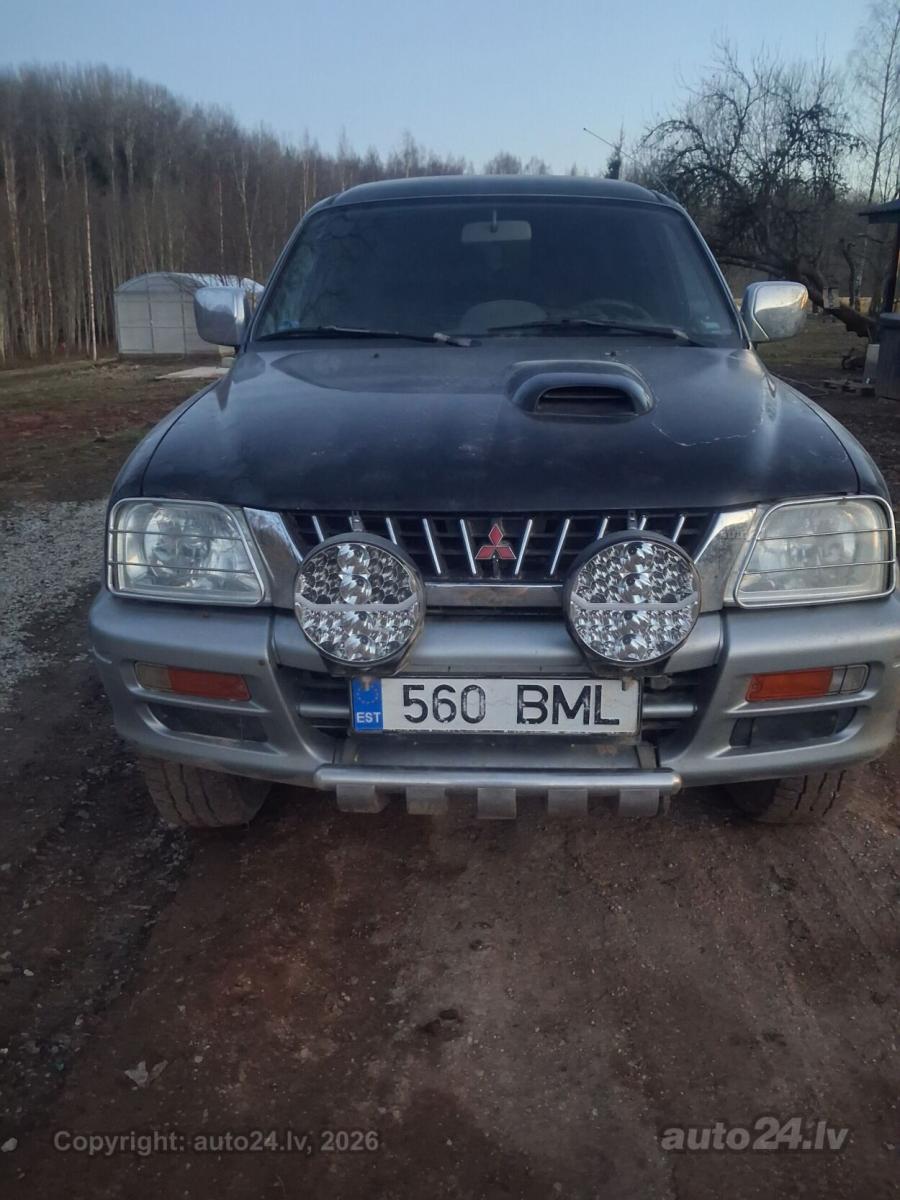 Black Mitsubishi l-200 2000 in Tallinn, with an engine capacity of 2.50 L and mileage of 299 thousand km for 4000 €, photo 1 on AUTOMOTO.COM.LV