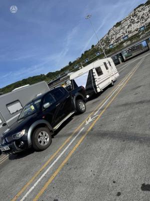 Black Mitsubishi l-200 2006 in Silute, with an engine capacity of 2.50 L and mileage of 160 thousand km for 5000 €, photo 15 on AUTOMOTO.COM.LV