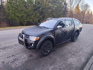 Black Mitsubishi l-200 2009 in Telschi, with an engine capacity of 2.50 L and mileage of 2587 thousand km for 14300 €, photo 2 on AUTOMOTO.COM.LV