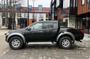 Black Mitsubishi l-200 2010 in Tallinn, with an engine capacity of 2.50 L and mileage of 342 thousand km for 7990 €, photo 10 on AUTOMOTO.COM.LV