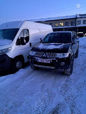 Black Mitsubishi l-200 2011 in Vilnius, with an engine capacity of 2.50 L and mileage of 245 thousand km for 9990 €, photo 20 on AUTOMOTO.COM.LV