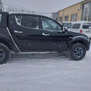 Black Mitsubishi l-200 2011 in Vilnius, with an engine capacity of 2.50 L and mileage of 245 thousand km for 9990 €, photo 21 on AUTOMOTO.COM.LV