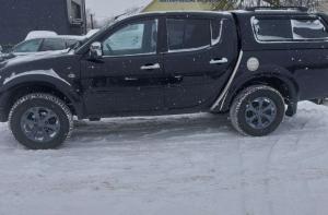 Black Mitsubishi l-200 2011 in Vilnius, with an engine capacity of 2.50 L and mileage of 245 thousand km for 9990 €, photo 22 on AUTOMOTO.COM.LV