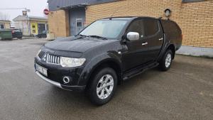 Black Mitsubishi l-200 2011 in Riga, with an engine capacity of 2.50 L and mileage of 159 thousand km for 9950 €, photo  on AUTOMOTO.COM.LV