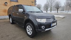 Black Mitsubishi l-200 2011 in Riga, with an engine capacity of 2.50 L and mileage of 159 thousand km for 9950 €, photo 4 on AUTOMOTO.COM.LV