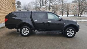 Black Mitsubishi l-200 2011 in Riga, with an engine capacity of 2.50 L and mileage of 159 thousand km for 9950 €, photo 5 on AUTOMOTO.COM.LV