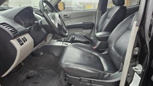 Black Mitsubishi l-200 2011 in Riga, with an engine capacity of 2.50 L and mileage of 159 thousand km for 9950 €, photo 10 on AUTOMOTO.COM.LV