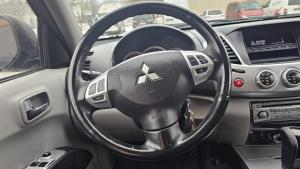 Black Mitsubishi l-200 2011 in Riga, with an engine capacity of 2.50 L and mileage of 159 thousand km for 9950 €, photo 15 on AUTOMOTO.COM.LV