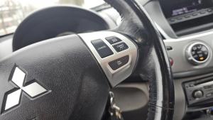 Black Mitsubishi l-200 2011 in Riga, with an engine capacity of 2.50 L and mileage of 159 thousand km for 9950 €, photo 16 on AUTOMOTO.COM.LV