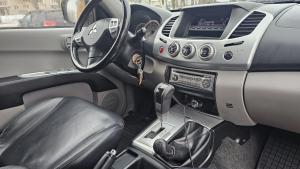 Black Mitsubishi l-200 2011 in Riga, with an engine capacity of 2.50 L and mileage of 159 thousand km for 9950 €, photo 24 on AUTOMOTO.COM.LV