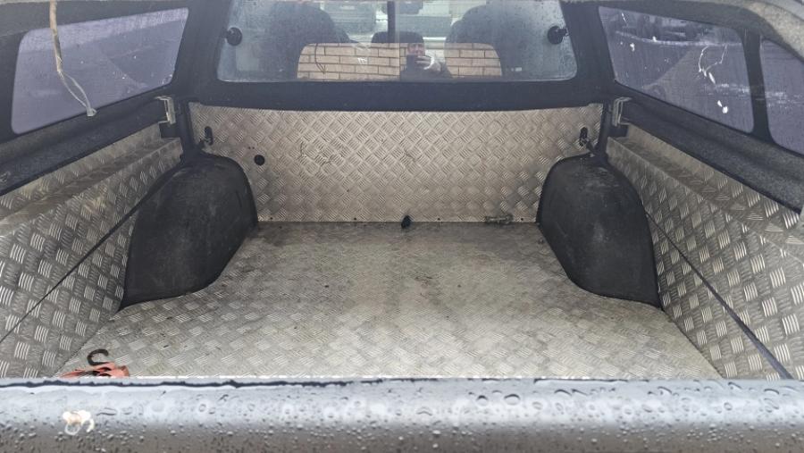 Black Mitsubishi l-200 2011 in Riga, with an engine capacity of 2.50 L and mileage of 159 thousand km for 9950 €, photo 26 on AUTOMOTO.COM.LV