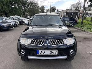 Black Mitsubishi l-200 2011 in Riga, with an engine capacity of 2.50 L and mileage of 159 thousand km for 10950 €, photo 3 on AUTOMOTO.COM.LV