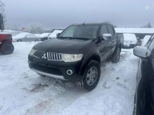 Melns Mitsubishi l-200 2013 Kauņa, ar dzinēja tilpumu 2.48 L un nobraukumu 195 tūkst. km par 6100 €, foto  vietnē AUTOMOTO.COM.LV
