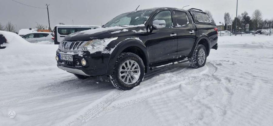 Black Mitsubishi l-200 2016 in Siauliai, with an engine capacity of 2.44 L and mileage of 240 thousand km for 15900 €, photo 2 on AUTOMOTO.COM.LV