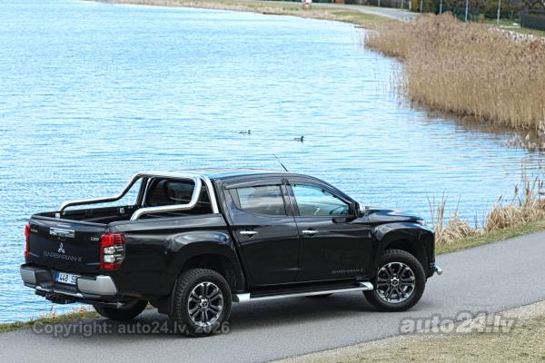 Black Mitsubishi l-200 2020 in Tallinn, with an engine capacity of 2.30 L and mileage of 163 thousand km for 26999 €, photo 4 on AUTOMOTO.COM.LV