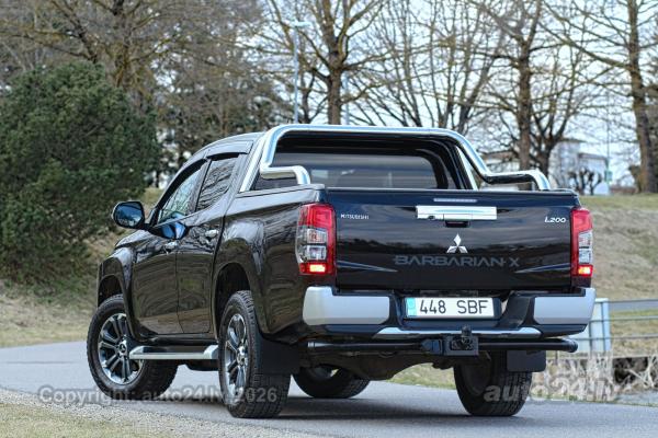 Black Mitsubishi l-200 2020 in Tallinn, with an engine capacity of 2.30 L and mileage of 163 thousand km for 26999 €, photo 6 on AUTOMOTO.COM.LV