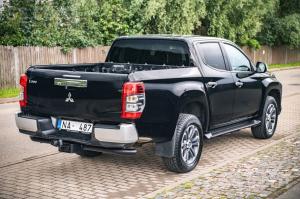 Melns Mitsubishi l-200 2021 Rīga, ar dzinēja tilpumu 2.30 L un nobraukumu 344 tūkst. km par 19990 €, foto 5 vietnē AUTOMOTO.COM.LV