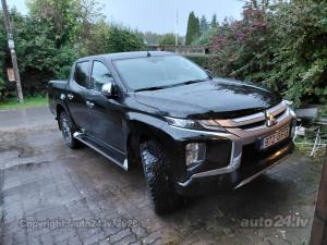 Black Mitsubishi l-200 2022 in Tallinn, with an engine capacity of 2.30 L and mileage of 116 thousand km for 29500 €, photo 3 on AUTOMOTO.COM.LV