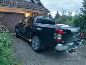 Black Mitsubishi l-200 2022 in Tallinn, with an engine capacity of 2.30 L and mileage of 116 thousand km for 29500 €, photo 6 on AUTOMOTO.COM.LV