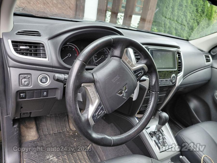 Black Mitsubishi l-200 2022 in Tallinn, with an engine capacity of 2.30 L and mileage of 116 thousand km for 29500 €, photo 9 on AUTOMOTO.COM.LV