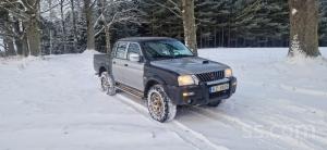 Melns Mitsubishi l-200 2001 Ogre, ar dzinēja tilpumu 2.50 L un nobraukumu 157 tūkst. km par 7250 €, foto 2 vietnē AUTOMOTO.COM.LV