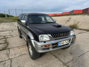 Black Mitsubishi l-200 2001 in Telschi, with an engine capacity of 2.50 L and mileage of 250 thousand km for 4000 €, photo  on AUTOMOTO.COM.LV