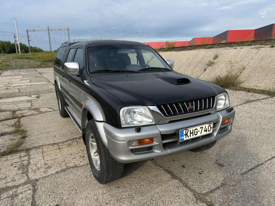 Black Mitsubishi l-200 2001 in Telschi, with an engine capacity of 2.50 L and mileage of 250 thousand km for 4000 €, photo 1 on AUTOMOTO.COM.LV