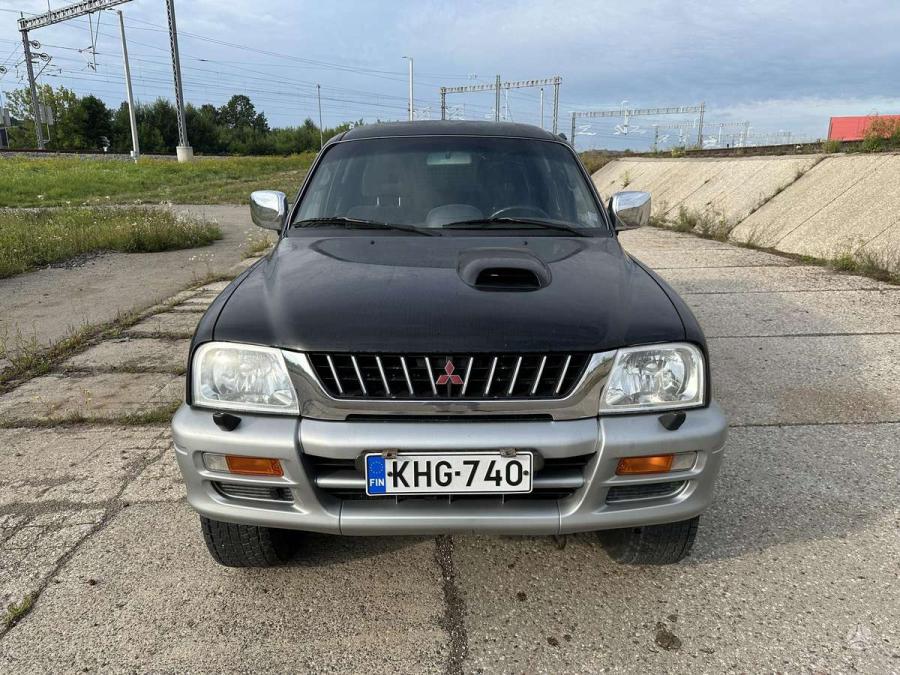 Black Mitsubishi l-200 2001 in Telschi, with an engine capacity of 2.50 L and mileage of 250 thousand km for 4000 €, photo 3 on AUTOMOTO.COM.LV