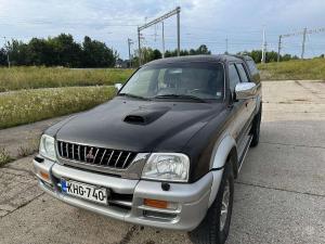 Black Mitsubishi l-200 2001 in Telschi, with an engine capacity of 2.50 L and mileage of 250 thousand km for 4000 €, photo 4 on AUTOMOTO.COM.LV