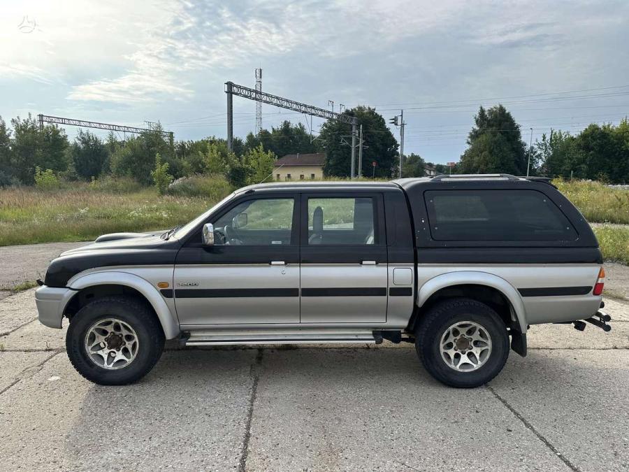 Black Mitsubishi l-200 2001 in Telschi, with an engine capacity of 2.50 L and mileage of 250 thousand km for 4000 €, photo 5 on AUTOMOTO.COM.LV