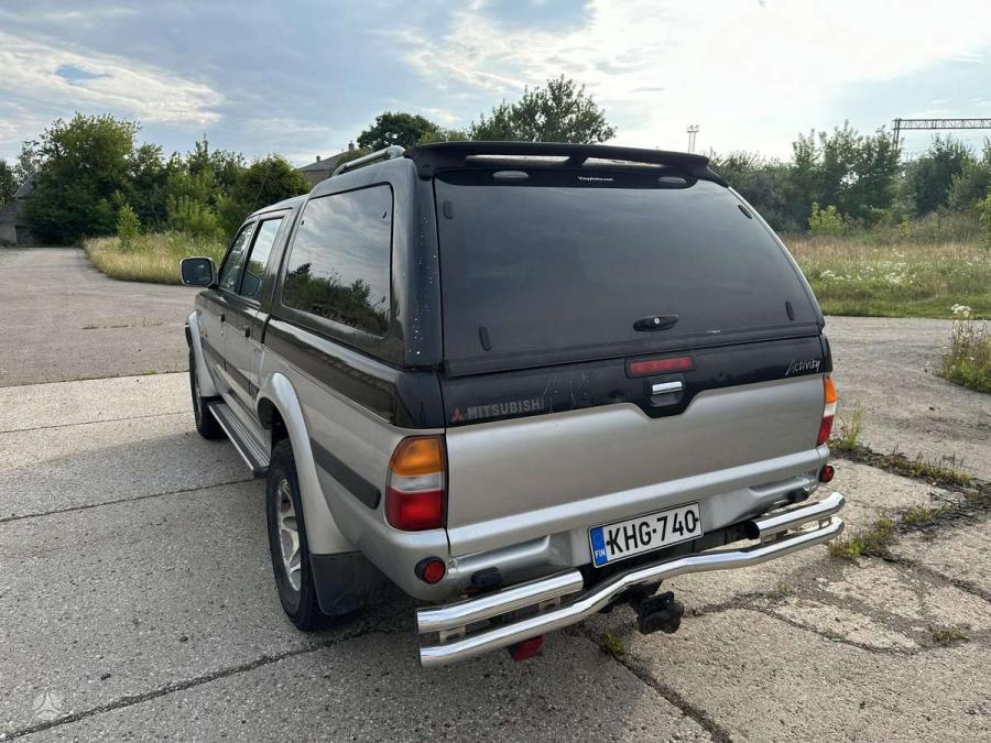Black Mitsubishi l-200 2001 in Telschi, with an engine capacity of 2.50 L and mileage of 250 thousand km for 4000 €, photo 6 on AUTOMOTO.COM.LV