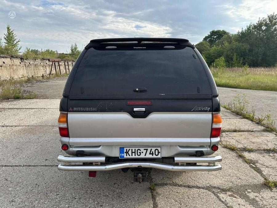 Black Mitsubishi l-200 2001 in Telschi, with an engine capacity of 2.50 L and mileage of 250 thousand km for 4000 €, photo 7 on AUTOMOTO.COM.LV