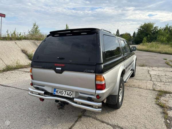 Black Mitsubishi l-200 2001 in Telschi, with an engine capacity of 2.50 L and mileage of 250 thousand km for 4000 €, photo 7 on AUTOMOTO.COM.LV