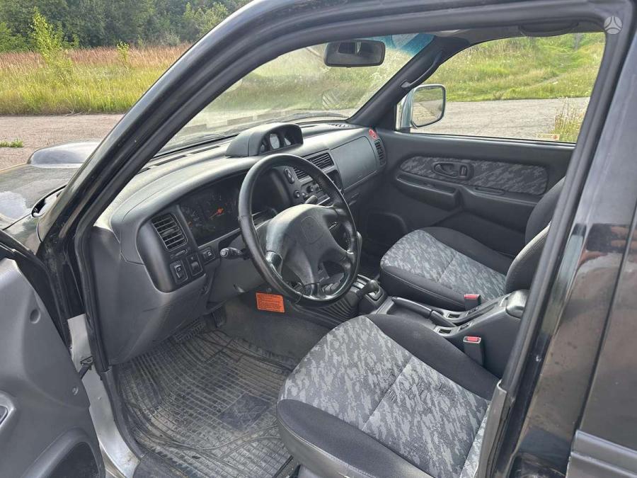 Black Mitsubishi l-200 2001 in Telschi, with an engine capacity of 2.50 L and mileage of 250 thousand km for 4000 €, photo 10 on AUTOMOTO.COM.LV