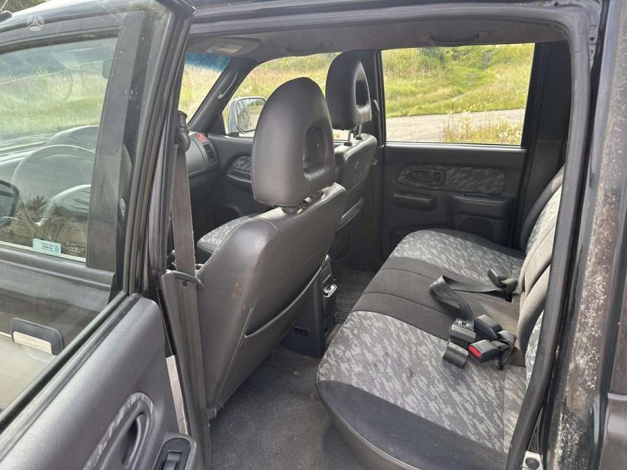 Black Mitsubishi l-200 2001 in Telschi, with an engine capacity of 2.50 L and mileage of 250 thousand km for 4000 €, photo 12 on AUTOMOTO.COM.LV