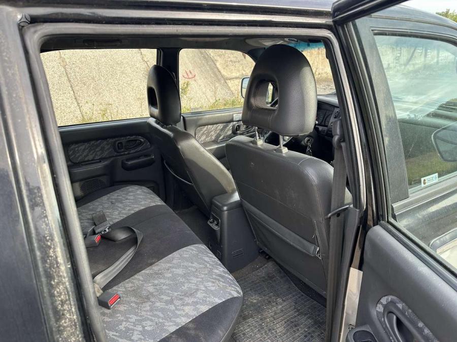Black Mitsubishi l-200 2001 in Telschi, with an engine capacity of 2.50 L and mileage of 250 thousand km for 4000 €, photo 13 on AUTOMOTO.COM.LV