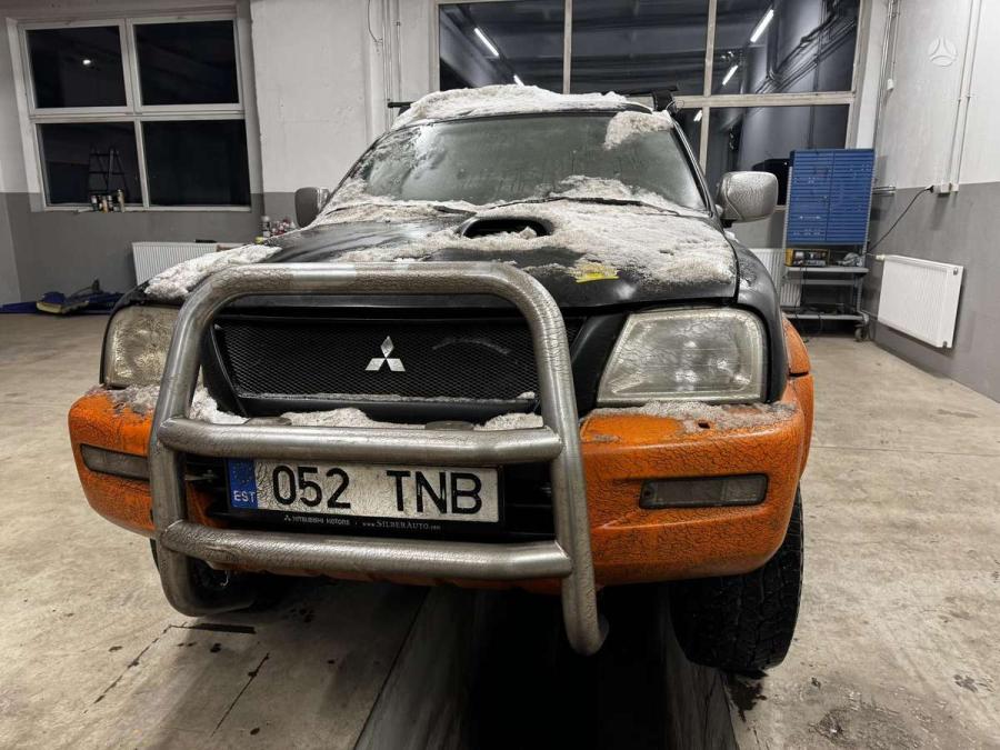 Melns Mitsubishi l-200 2004 Hāpsalu, ar dzinēja tilpumu 2.48 L un nobraukumu 254 tūkst. km par 4588 €, foto 9 vietnē AUTOMOTO.COM.LV